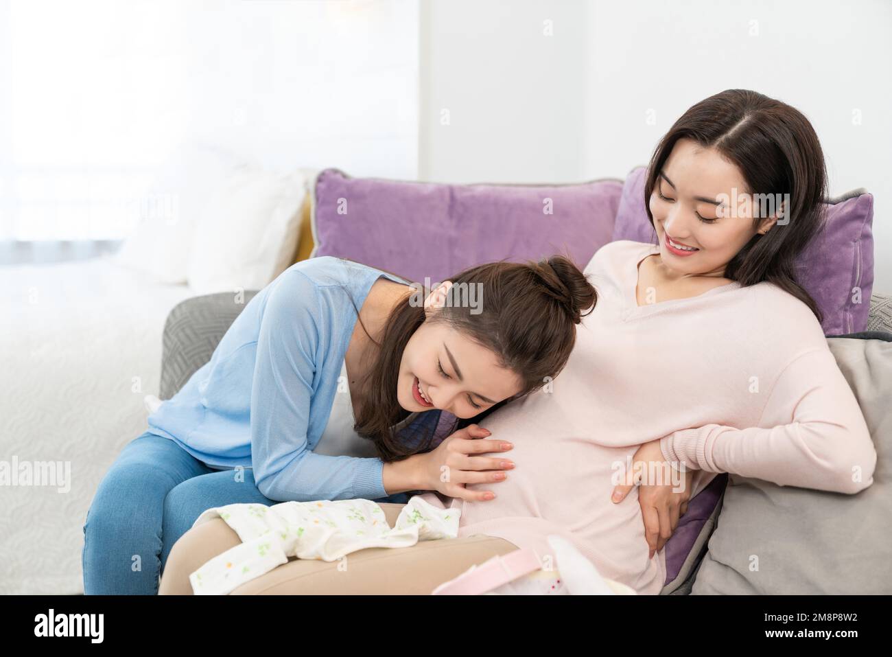 Pregnant women to family life Stock Photo - Alamy