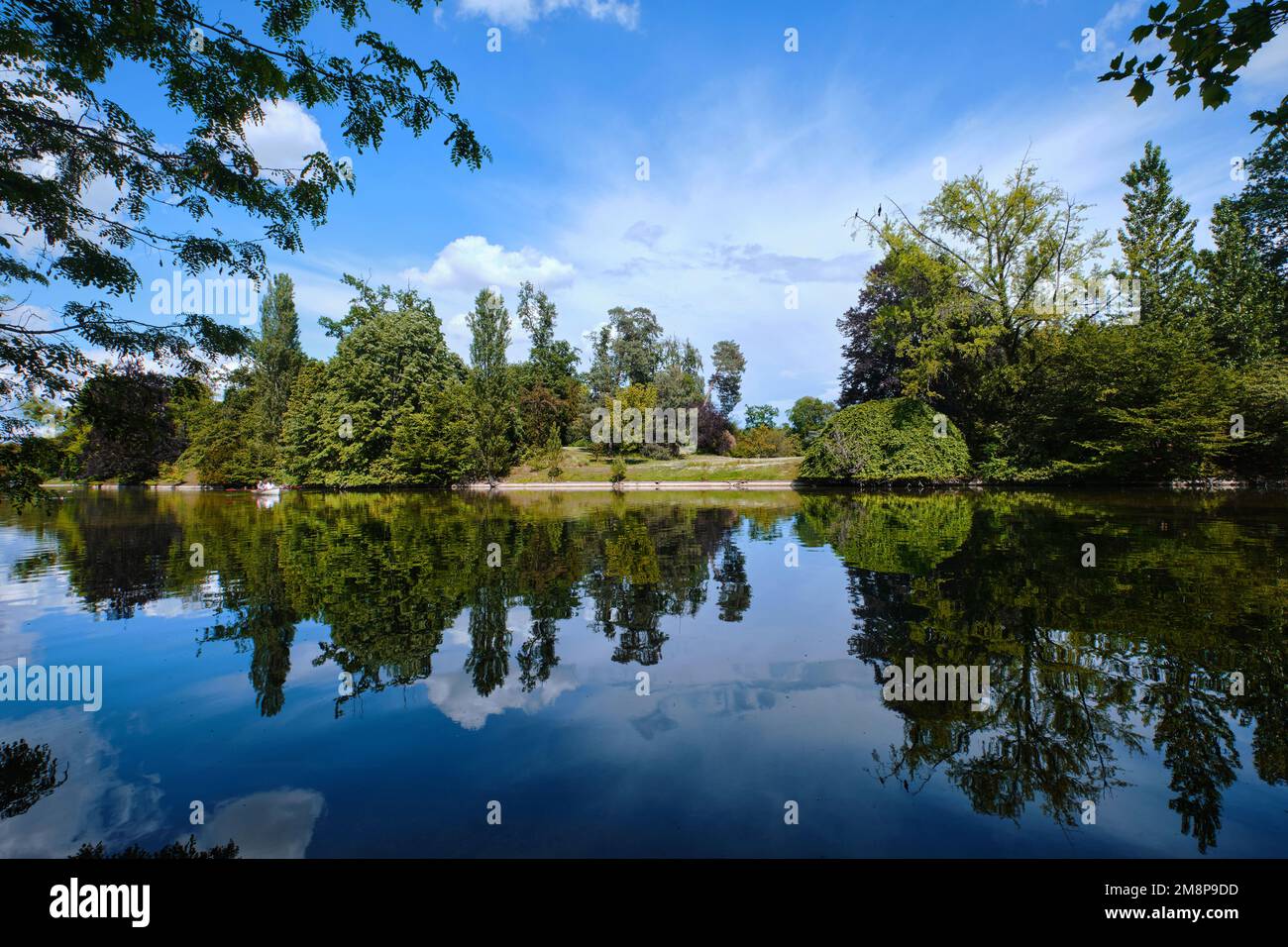 Paris, France - May, 2022: View of lower lake in the Bois de Boulogne ...