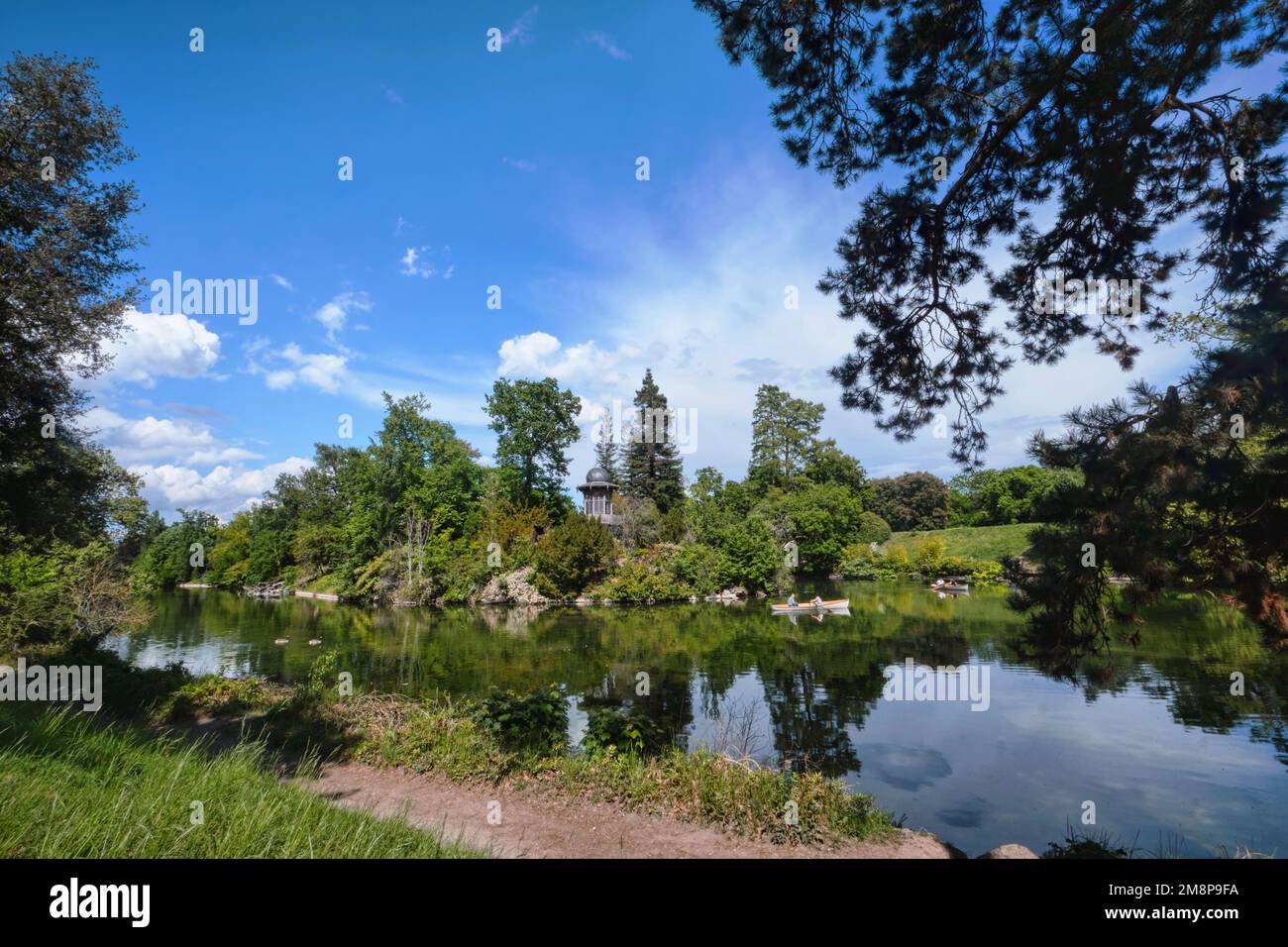 Paris, France - May, 2022: View of lower lake in the Bois de Boulogne ...