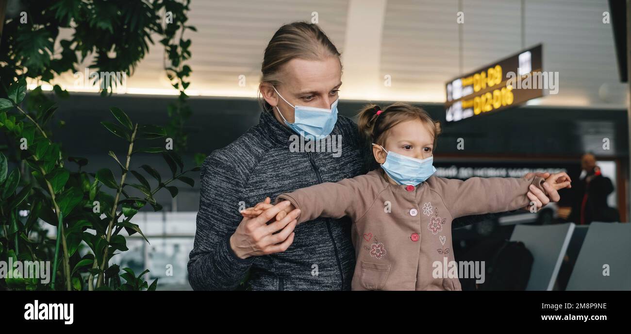 Man with girl ready to fly by airplane and the airport. Father and ...