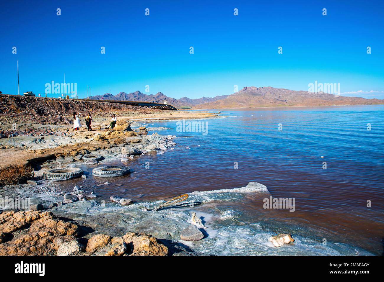 A scenic view of rocky shore of Lake Urmia in Iran under a cloudless ...
