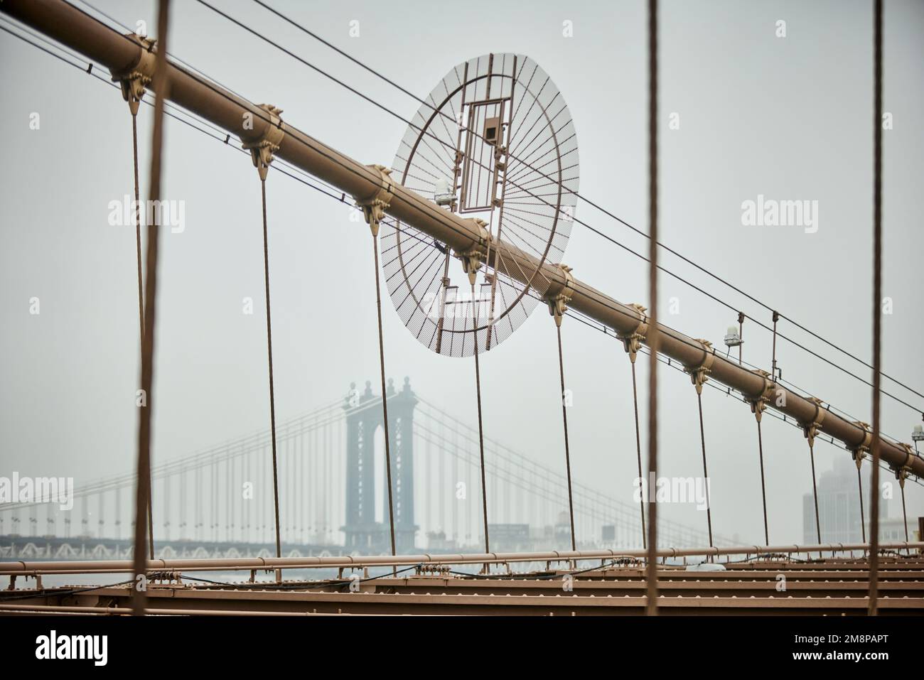 New York city Manhattan Brooklyn Bridge in the wet winder mist looking ...