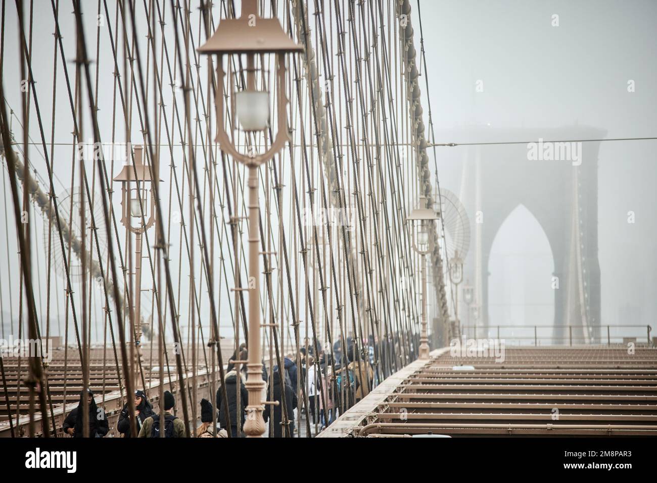 New York city Manhattan Brooklyn Bridge in the wet winder mist Stock ...