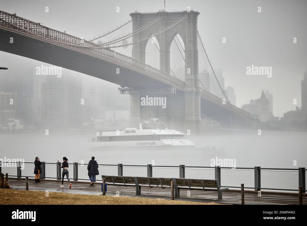New York city Brooklyn Dumbo area with landmark Brooklyn Bridge in the ...