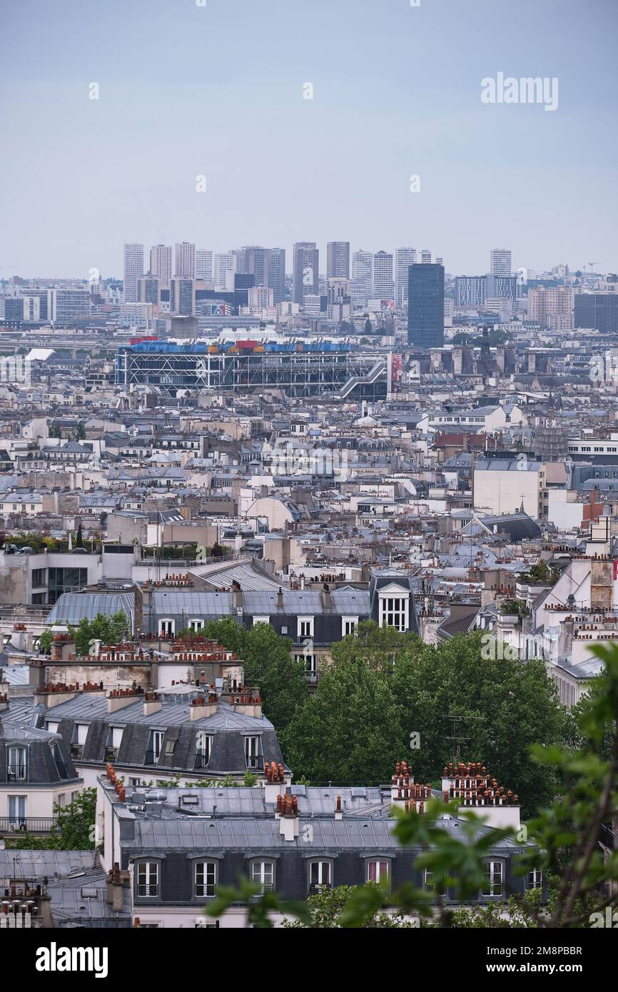 Paris, France - May, 2022: View of Paris cityscape and roofs with ...