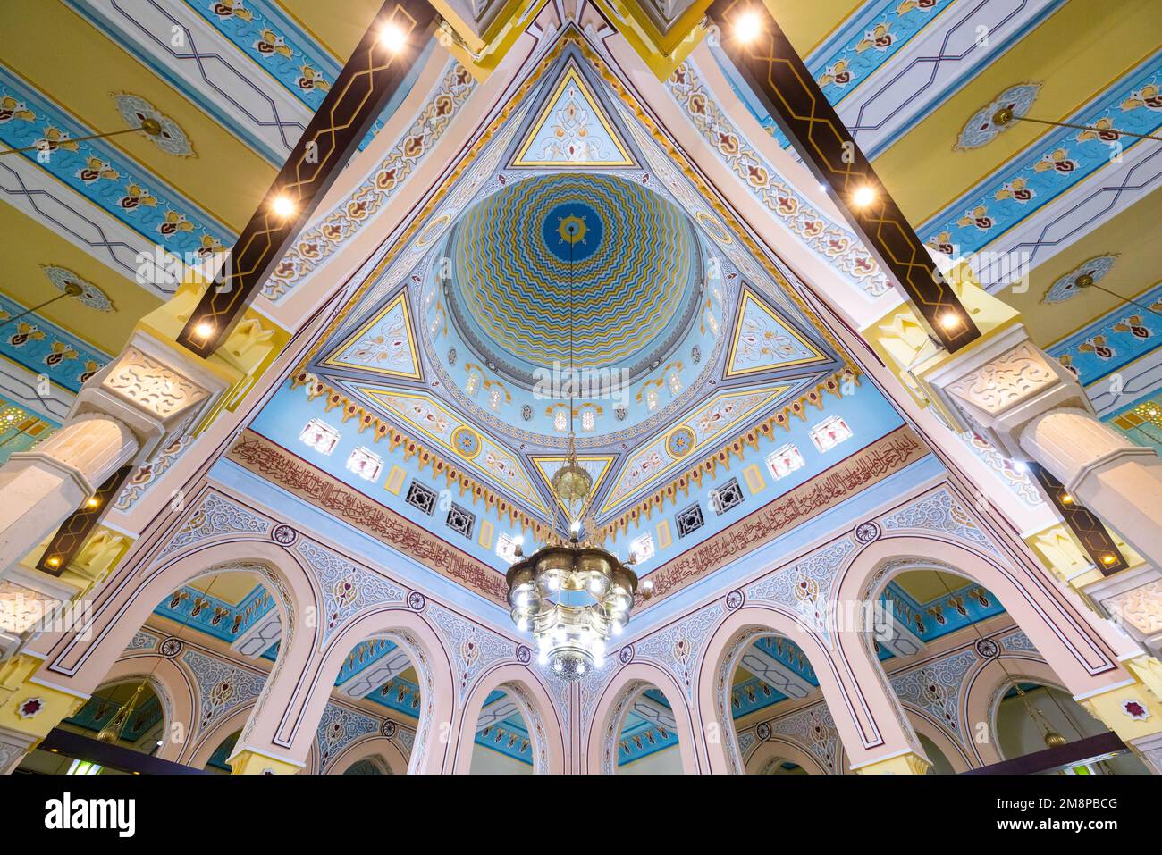 Symmetrical wide angle view of the colorful interior of the Jumeirah ...