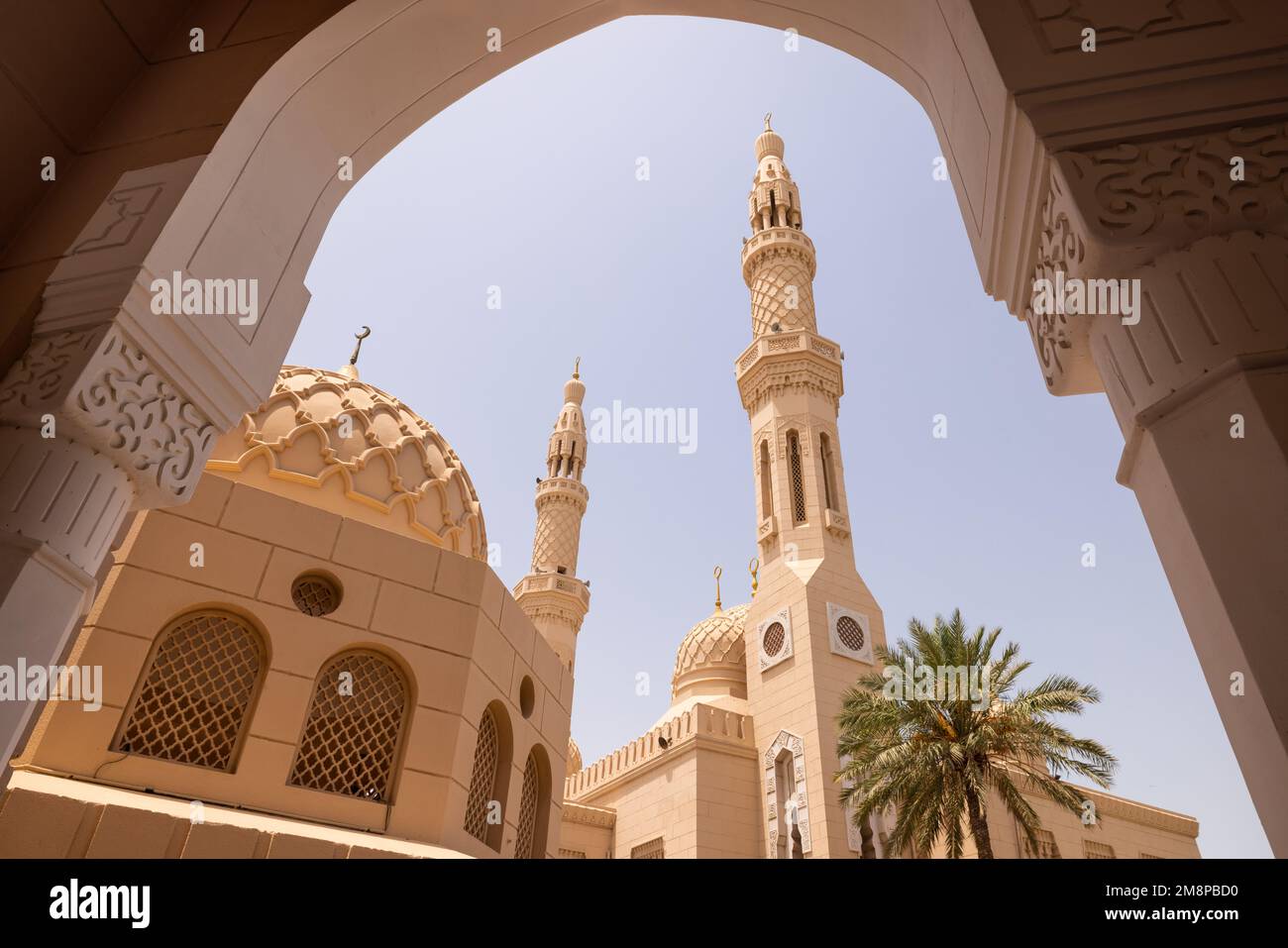 Wide angle view of the minarets of Jumeirah mosque as seen from a nearby colonnade Stock Photo ...