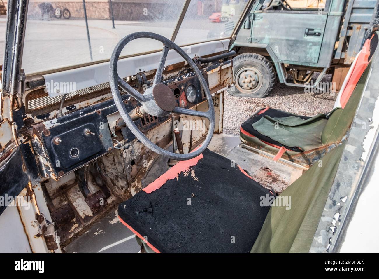 Abandoned and rusty military vehicles in the middle of the desert Stock ...
