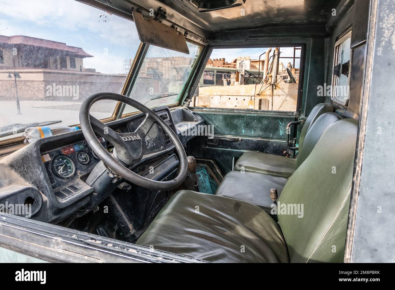 Abandoned and rusty military vehicles in the middle of the desert Stock ...