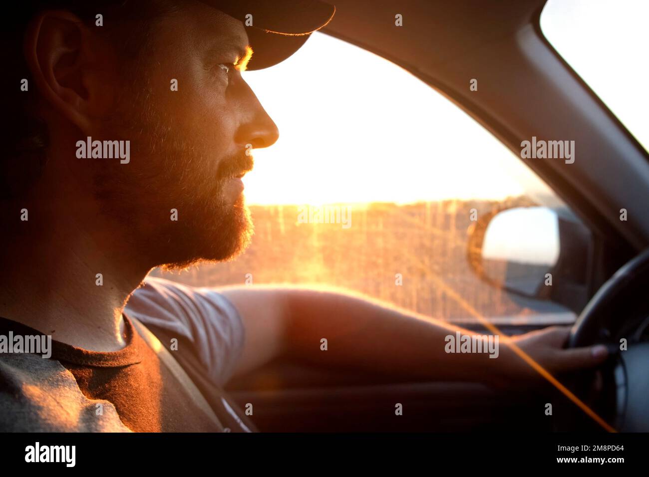 Man Driving Car Side View
