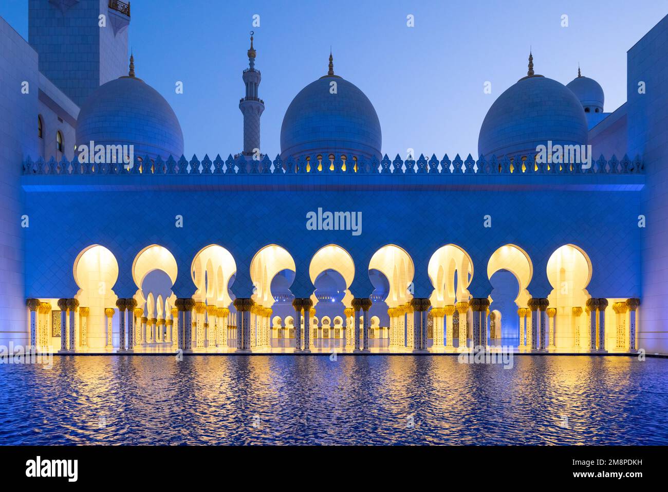 Sideview during the blue hour of the majestic Sheik Zayed mosque in Abu ...