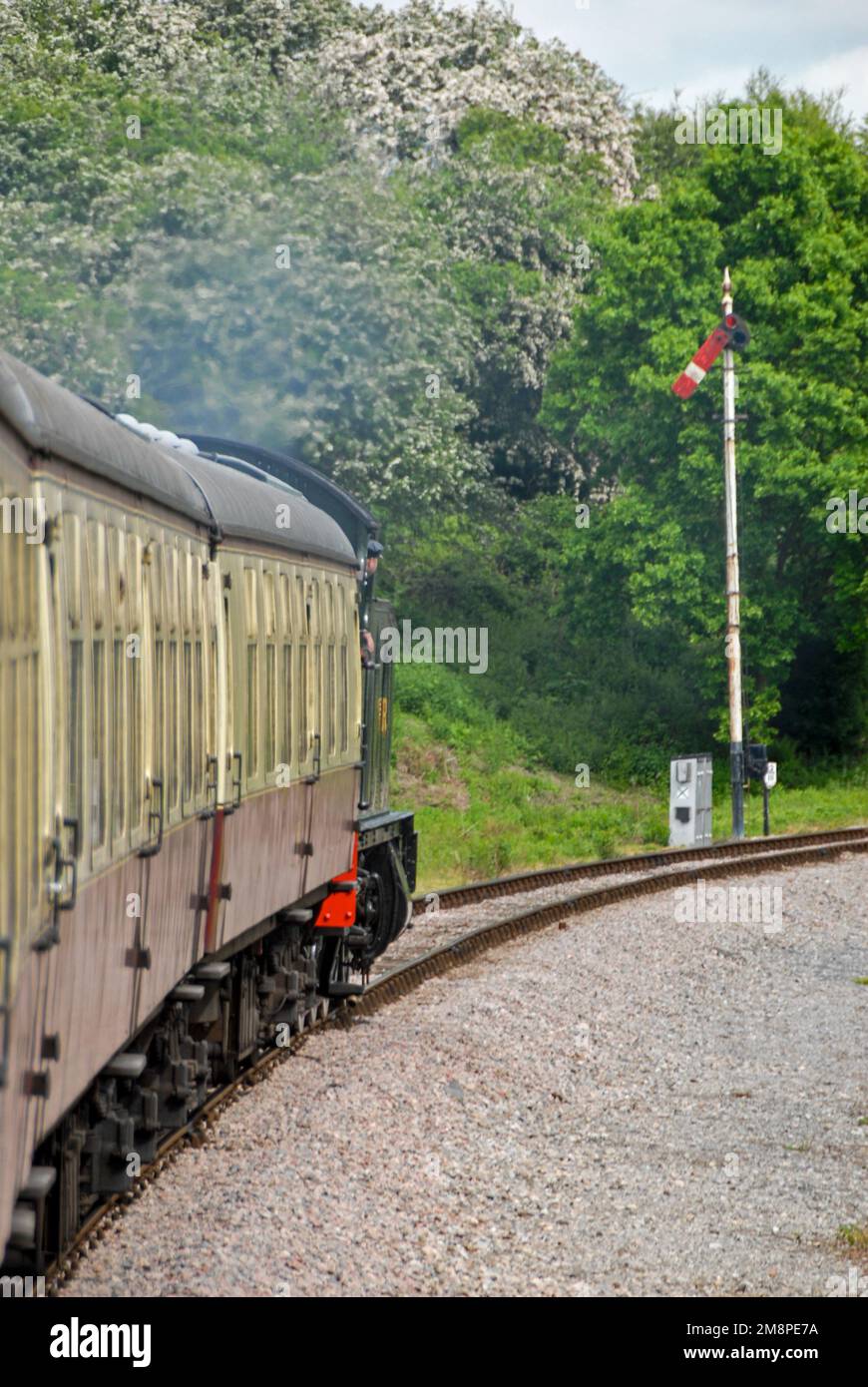On board a steam train approaching a signal nearing Winchcombe, a small ...