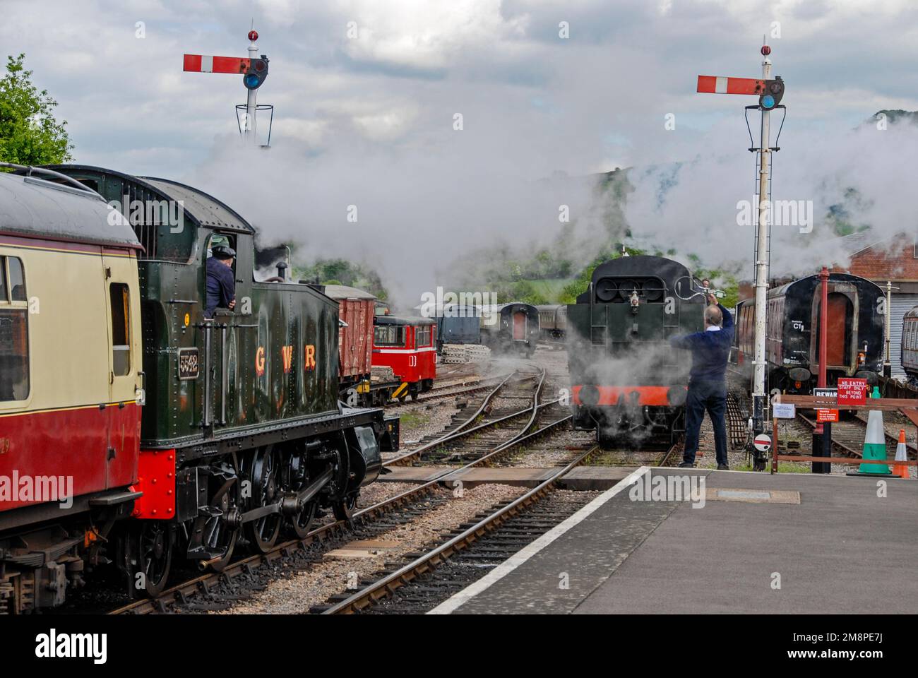 Two steam trains travelled in opposite directions at Winchcombe station in the Cotswolds in ...