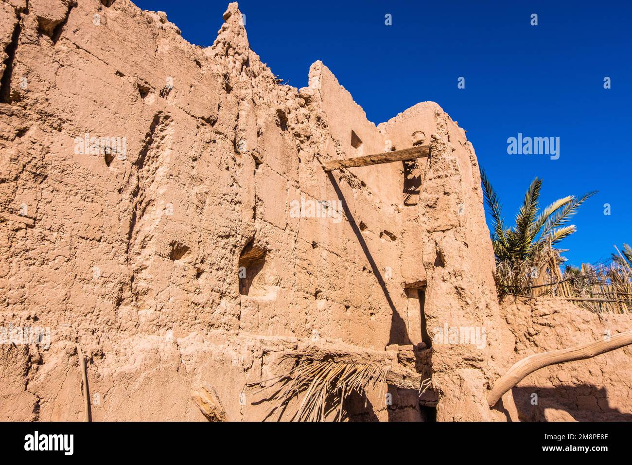 An old kasbah built by the Berbers, with traditional mud brick ...