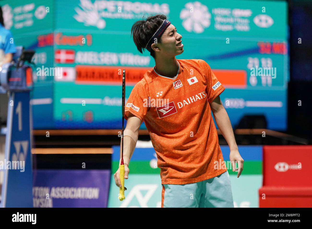 Japan's Kodai Naraoka reacts during his men's singles finals match ...