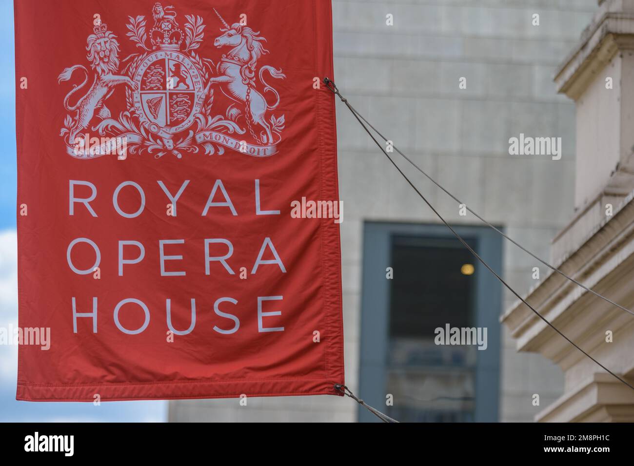Flags outside the Royal Opera in London's Covent Garden display the ...
