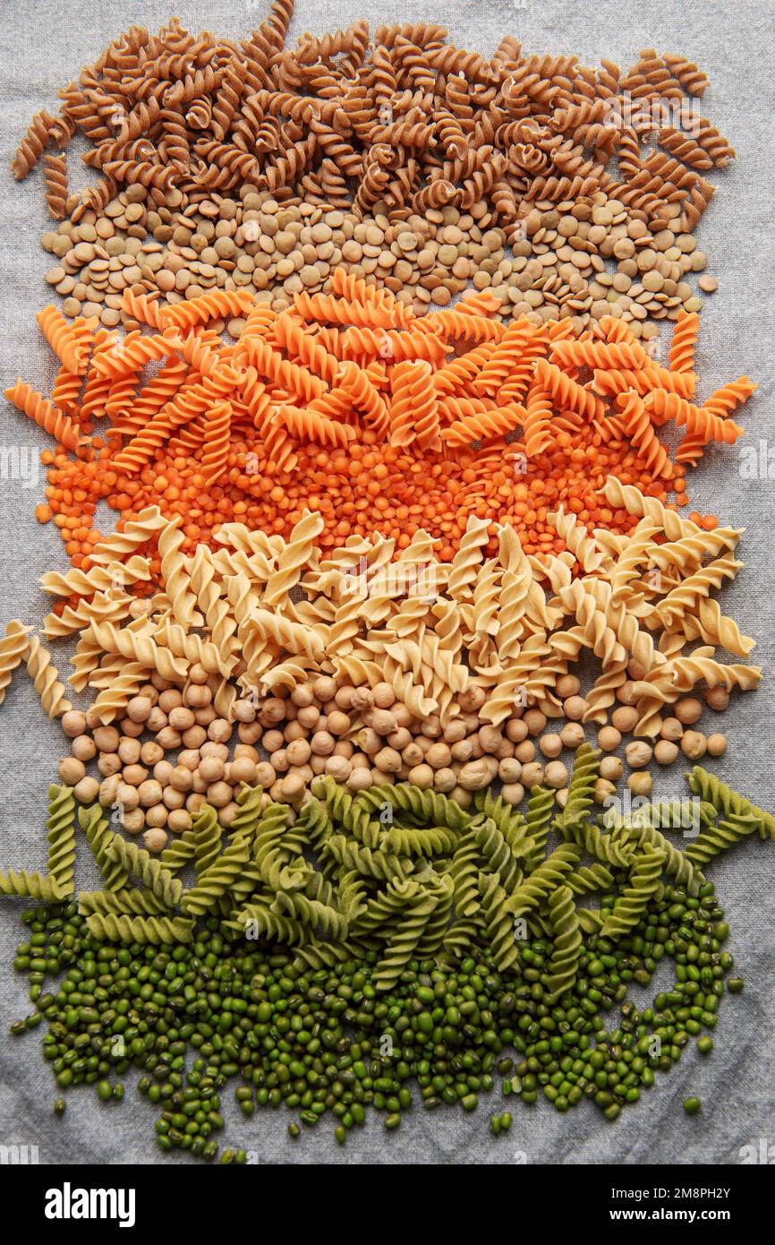 A variety of fusilli pasta made from different types of legumes, green ...