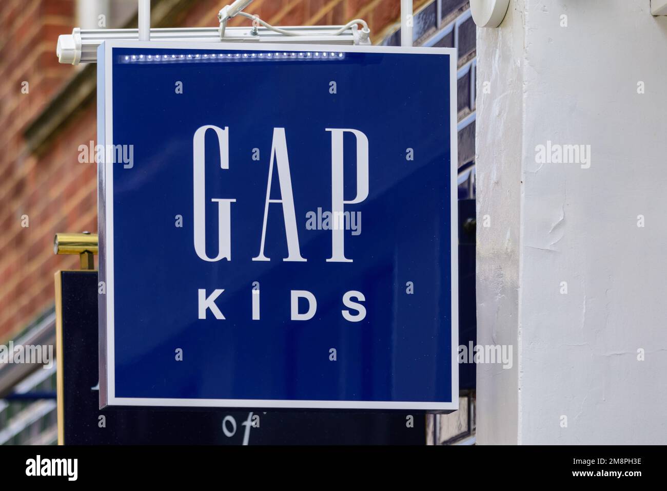 Sign outside a GAP clothing store on a high street in central London ...