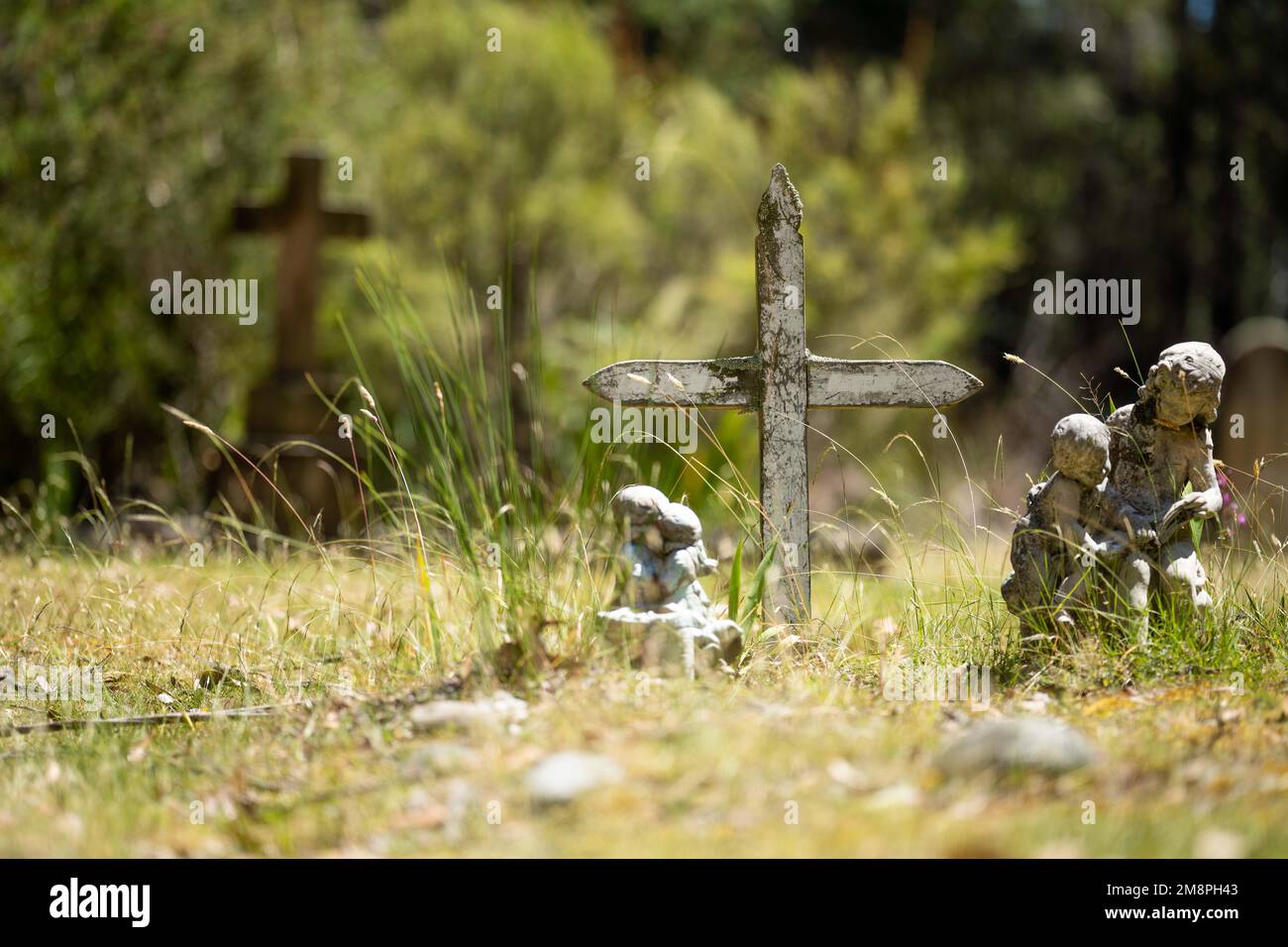 cemetery graves and cross in a graveyard in a church Stock Photo - Alamy