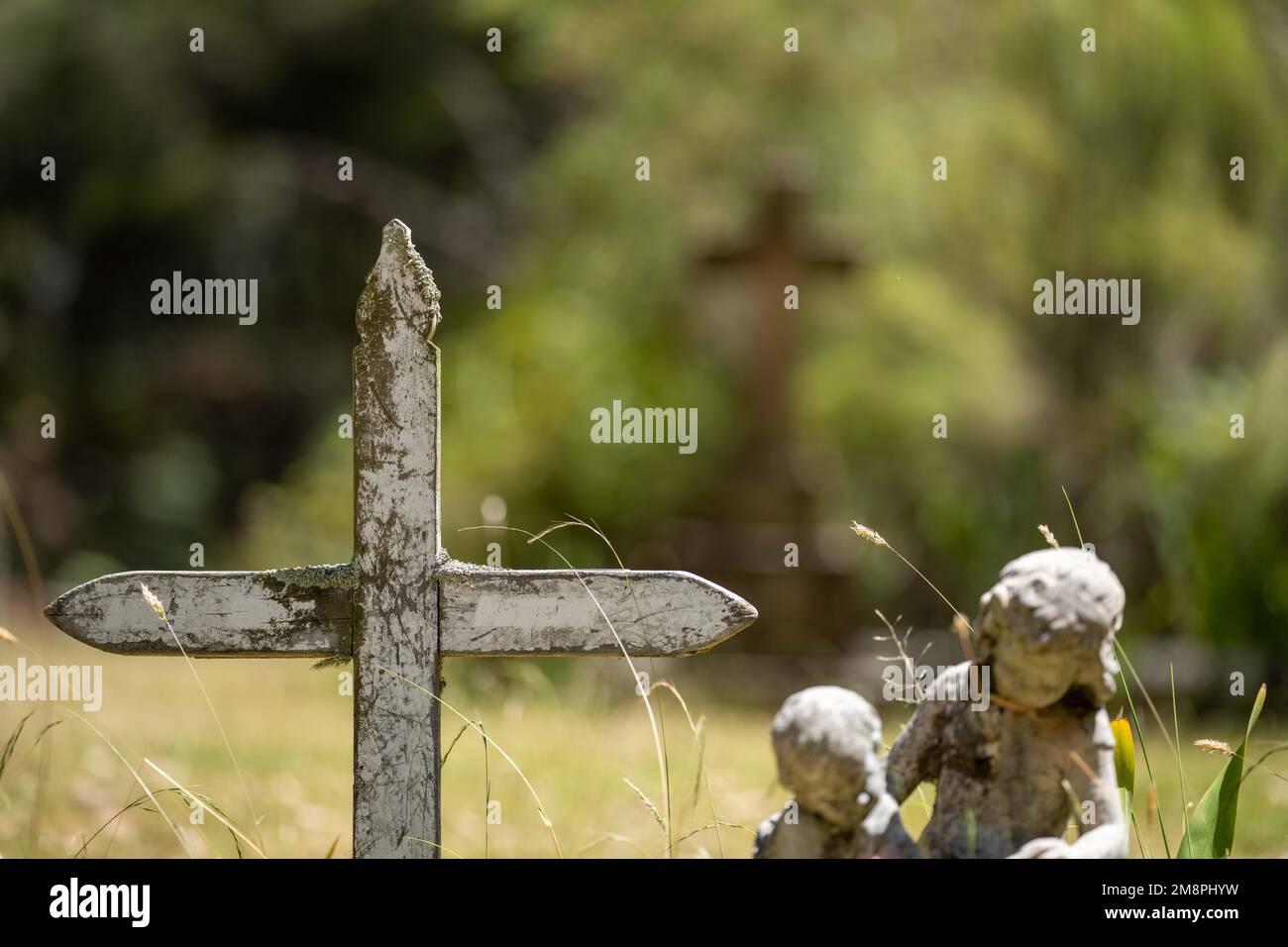 cemetery graves and cross in a graveyard in a church Stock Photo - Alamy