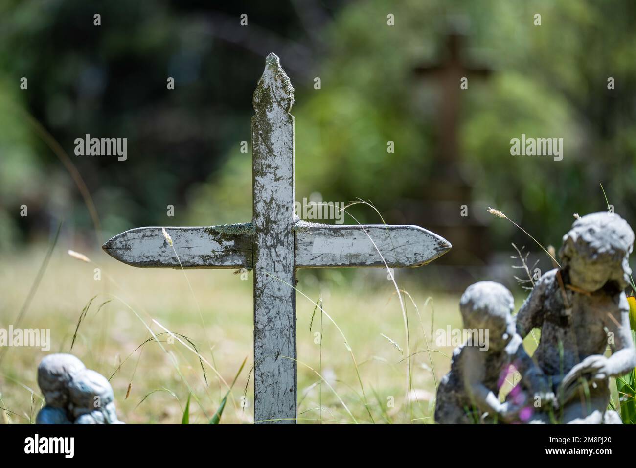 cemetery graves and cross in a graveyard in a church Stock Photo - Alamy