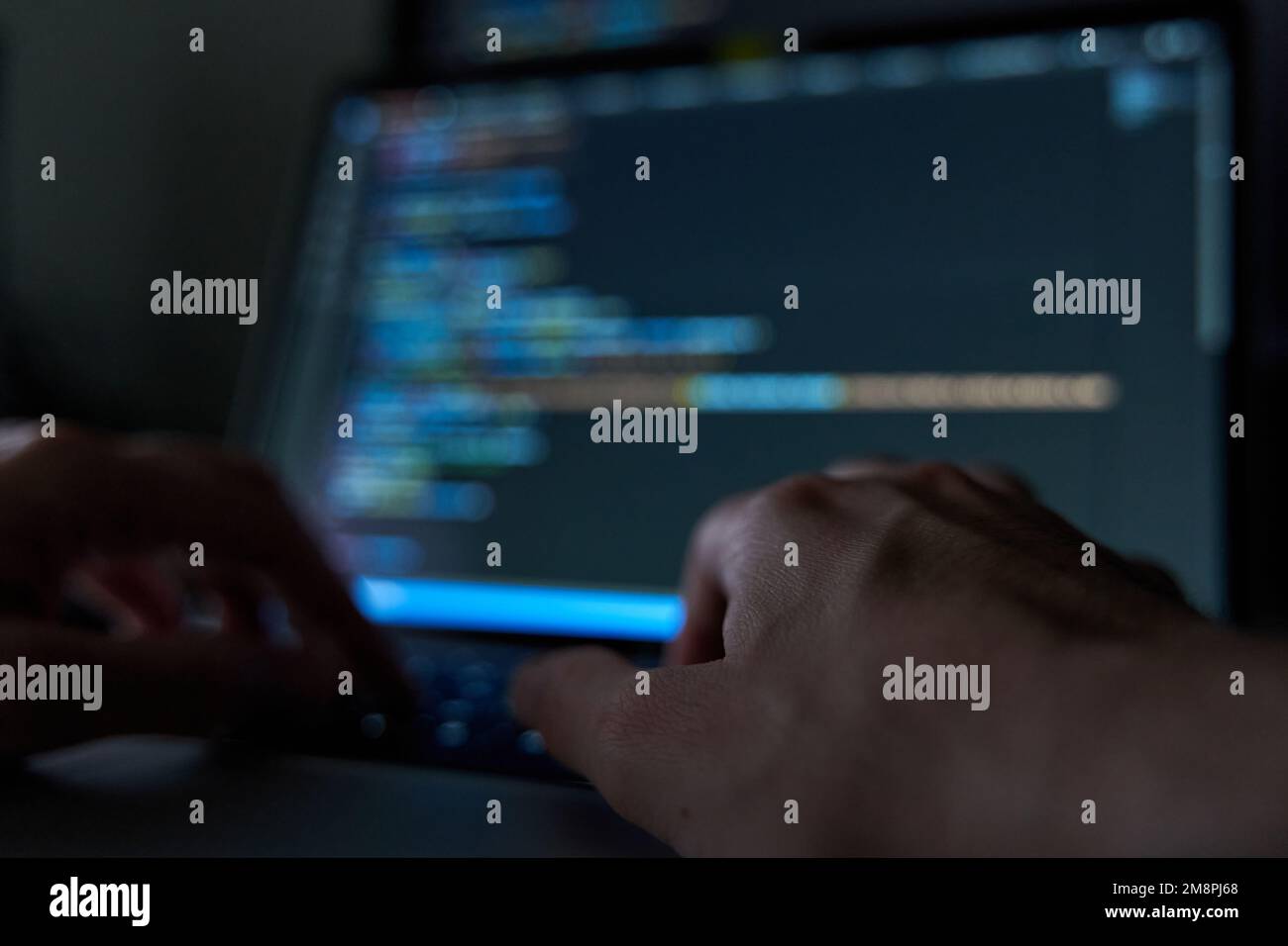 Hands writing code on laptop. Software and web development with ... Hands writing code on laptop. Software and web development with ...