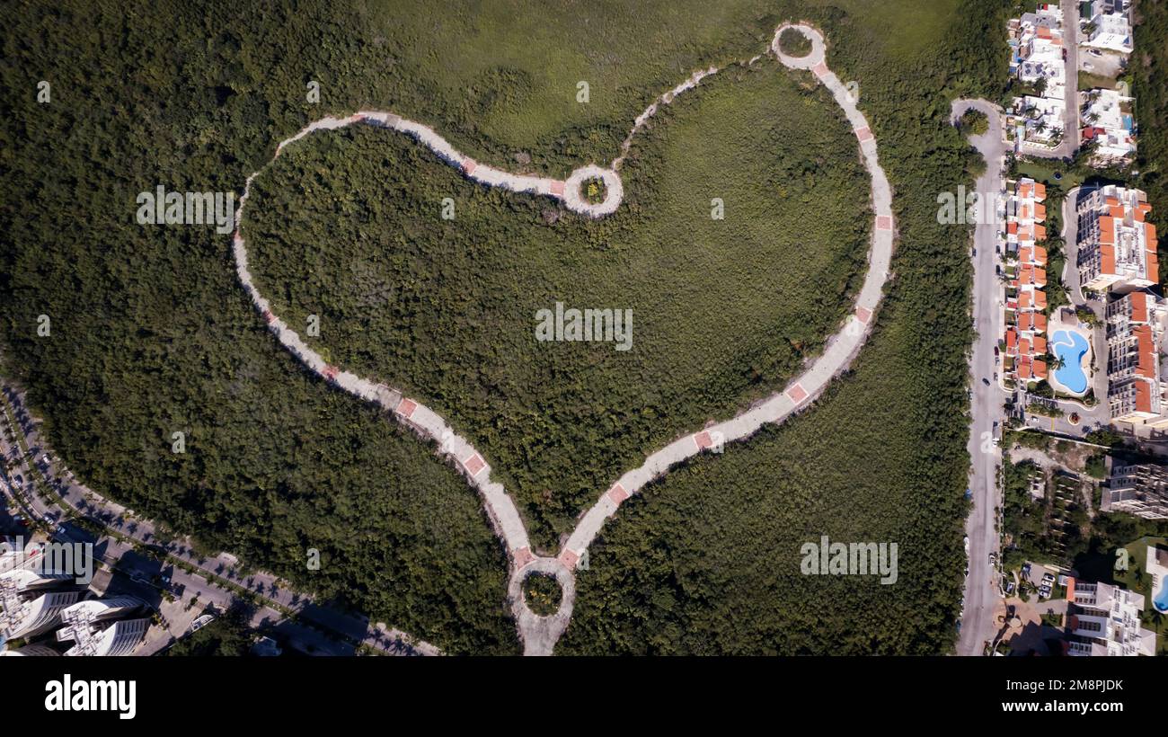 Theme for Valentine's day. Aerial view of a heart shaped road and ...