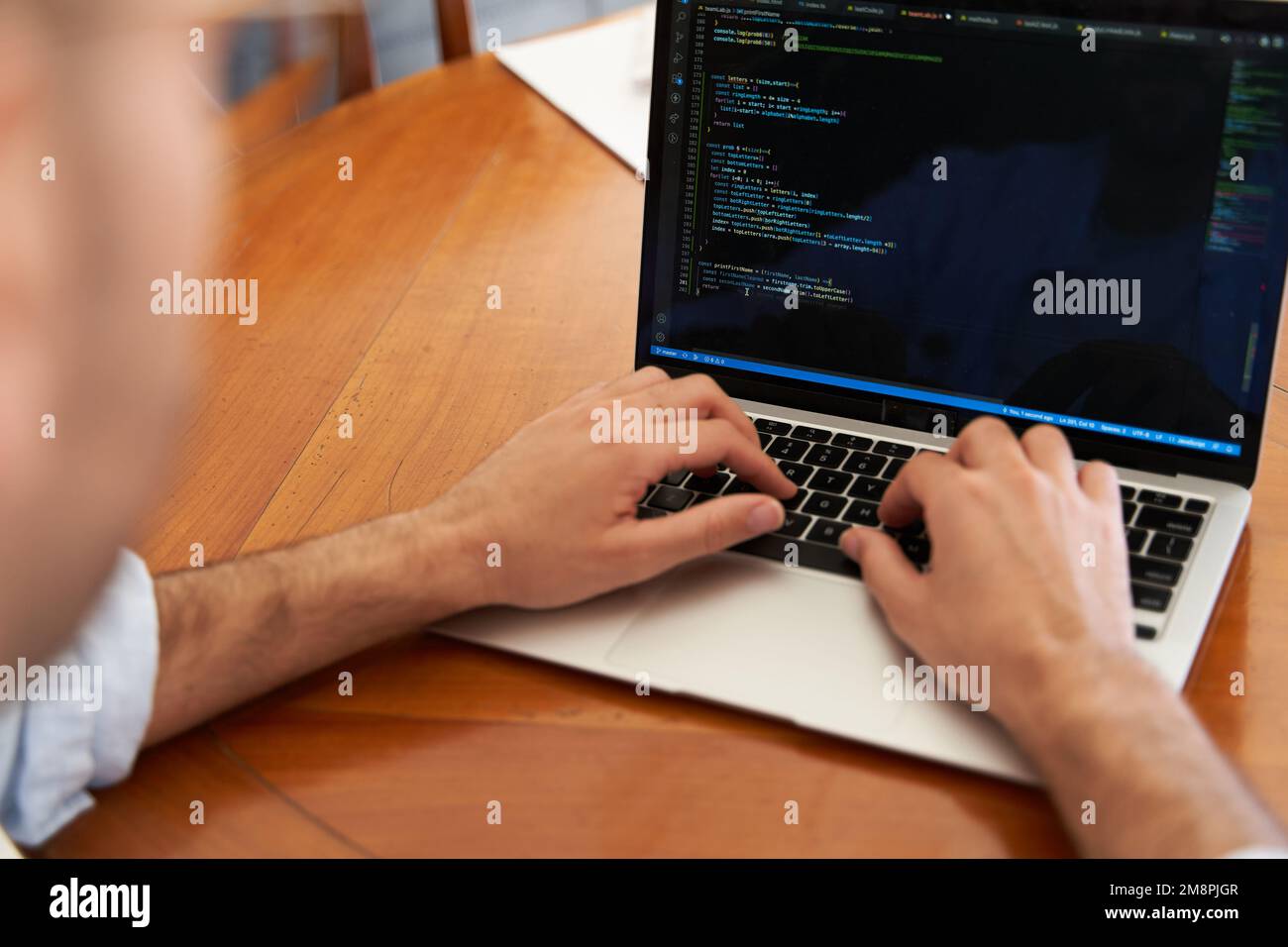 Male coding on laptop. Web developing and software coding concept Stock ...
