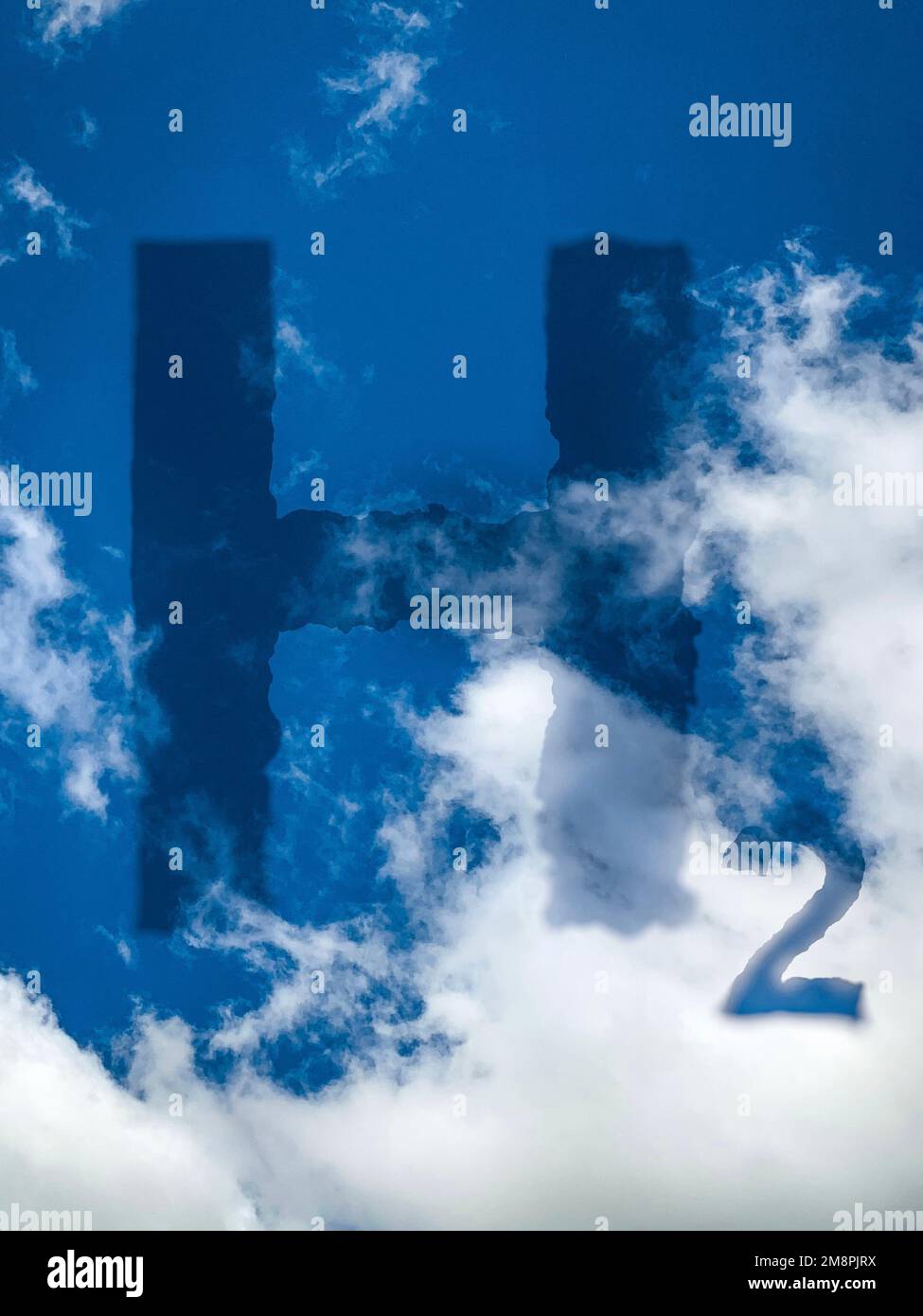 Concept for green hydrogen. H2 symbol floating in a clear blue sky ...