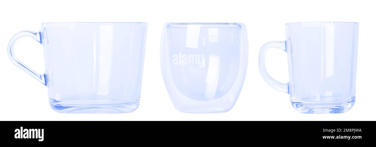 a set of blue glass mugs of different sizes Small and large mugs. Empty ...
