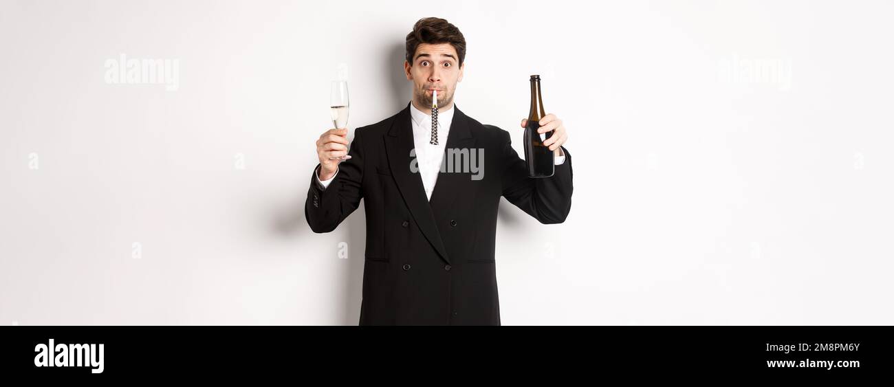 Concept of holidays, party and celebration. Portrait of handsome guy in ...