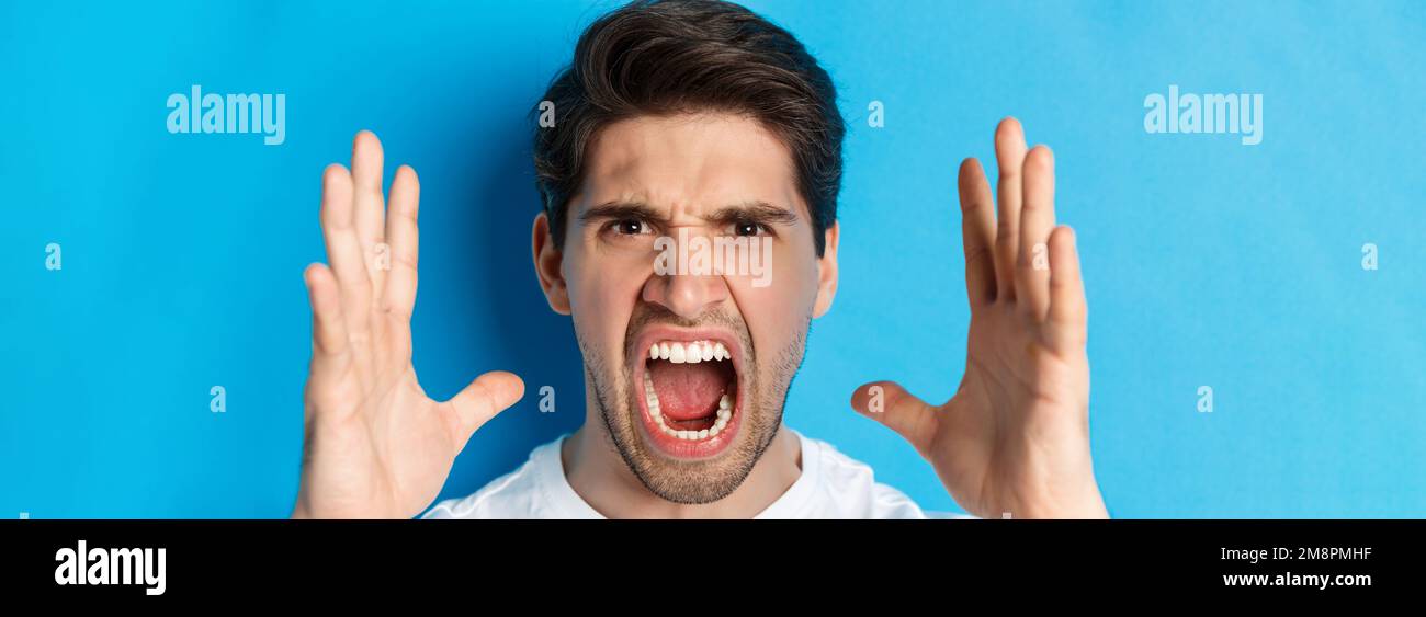 Headshot of man showing anger and frustration, yelling with outraged ...