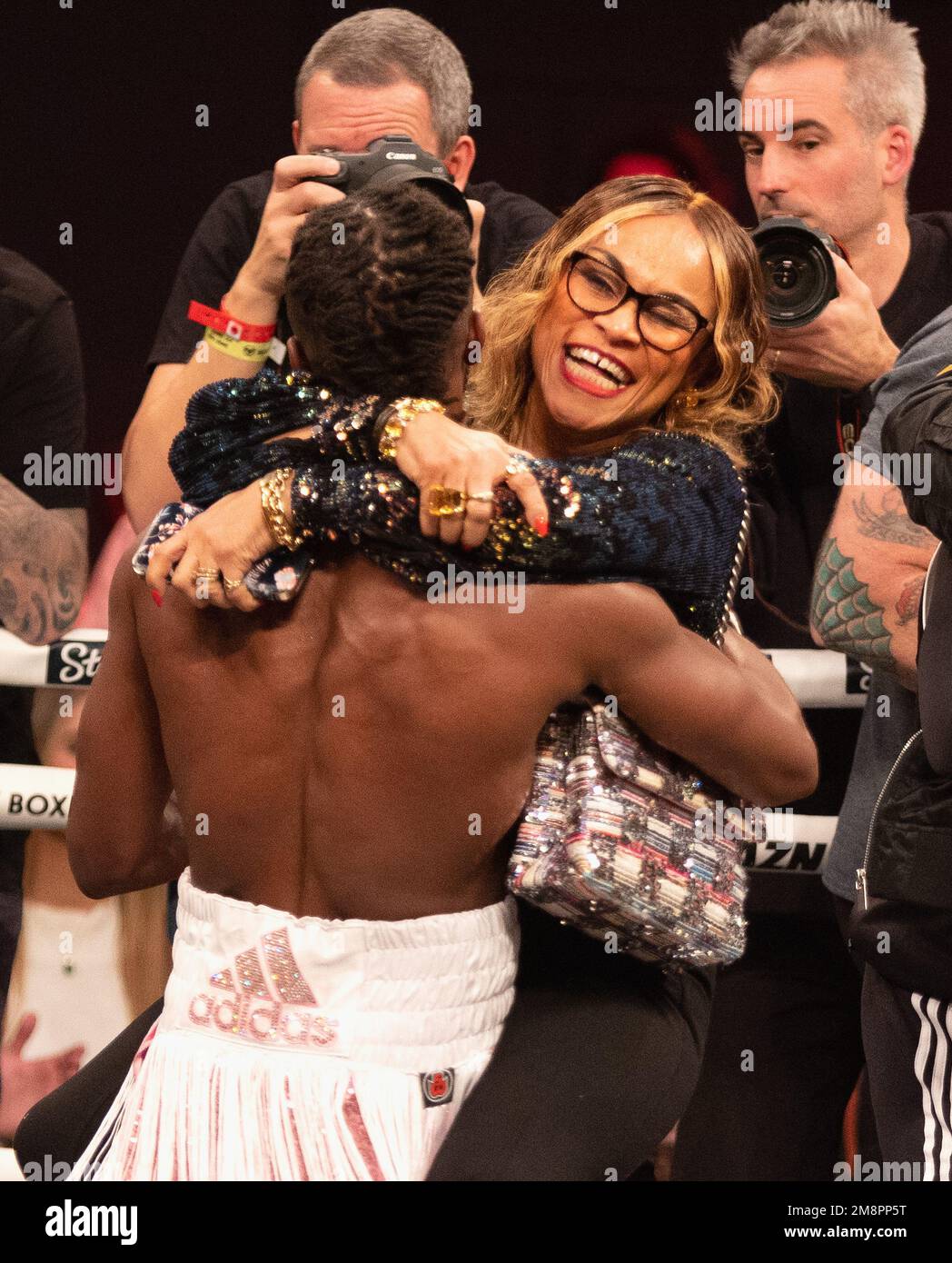 KSI's mother Yinka Olatunji Wiki hugs her son following his victory in ...