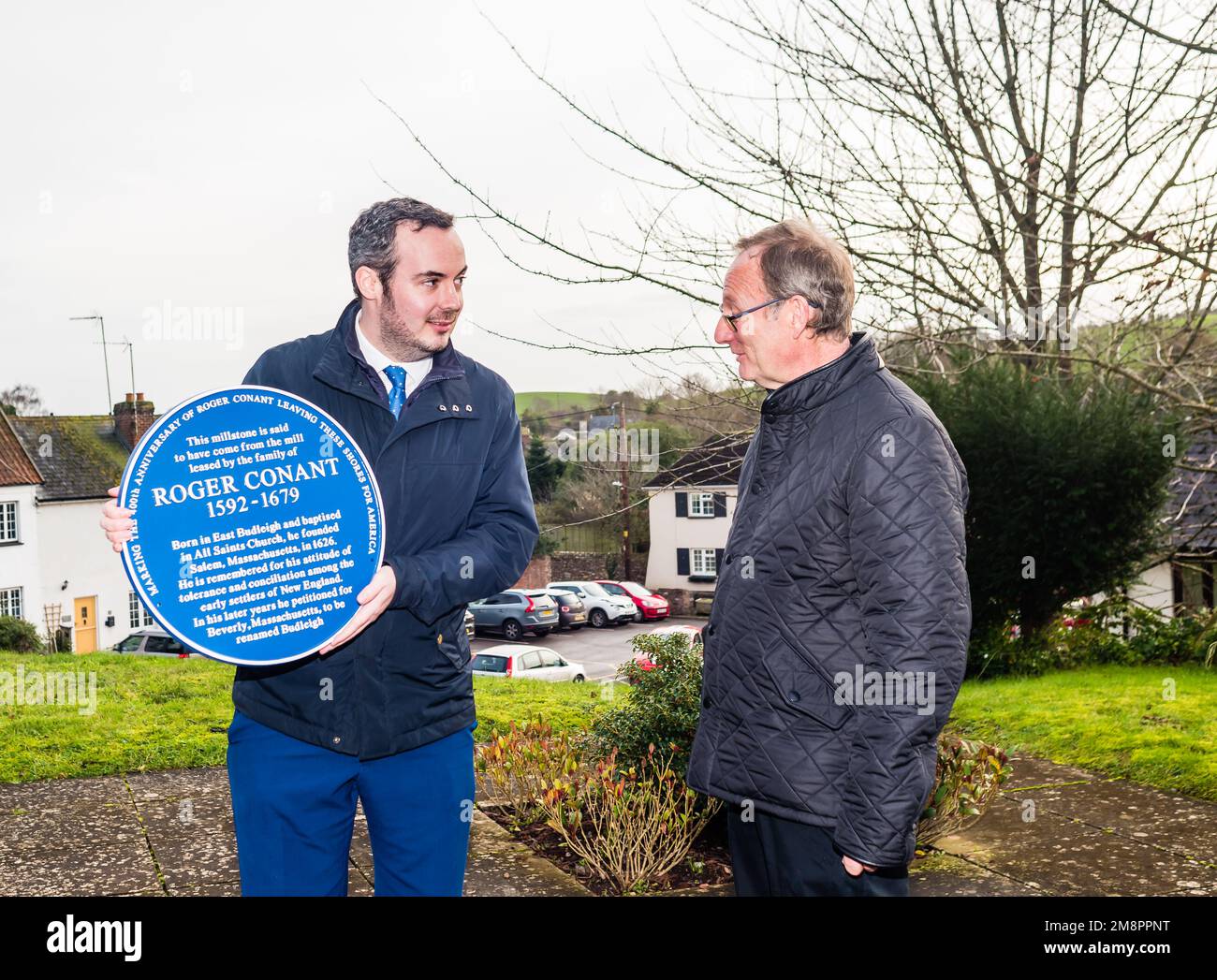 MP discussing the Roger Conant Plaque at All Saints East Budleigh Stock ...