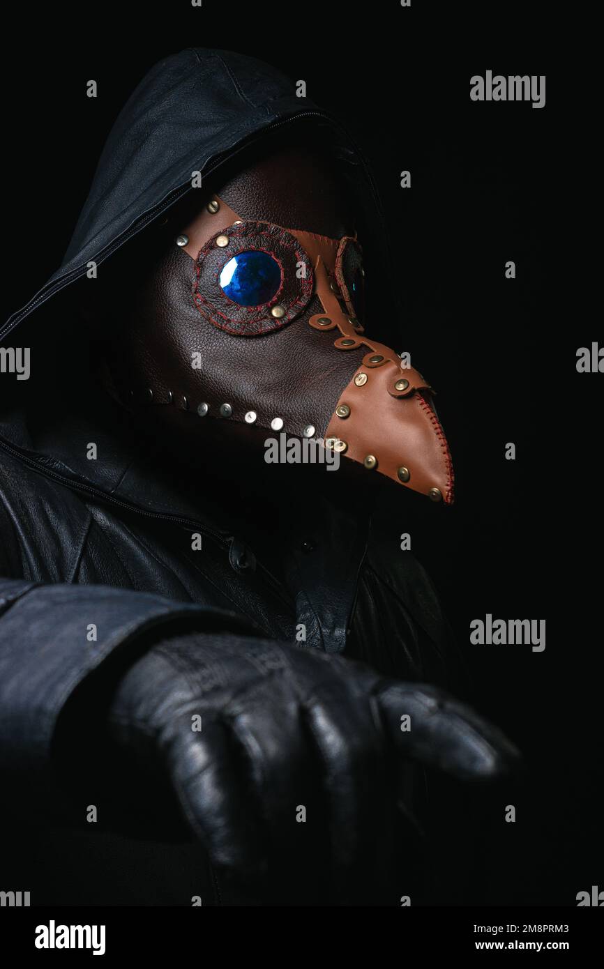 Plague doctor with crow-like mask isolated on black background Creepy ...