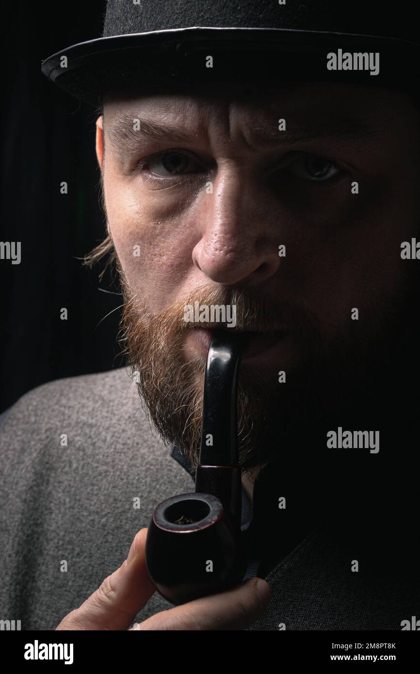 stylish man in retro outfit suit hat smoking wooden pipe sherlock ...