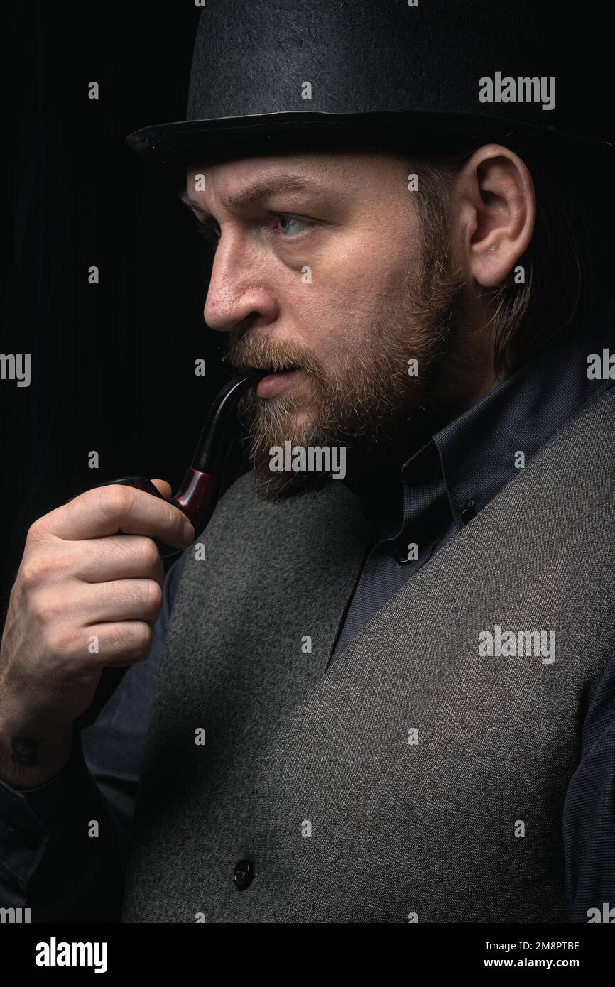 stylish man in retro outfit suit hat smoking wooden pipe sherlock ...