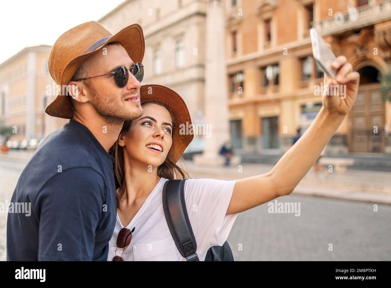 Happy Young couple taking selfie portrait with smartphone mobile ...
