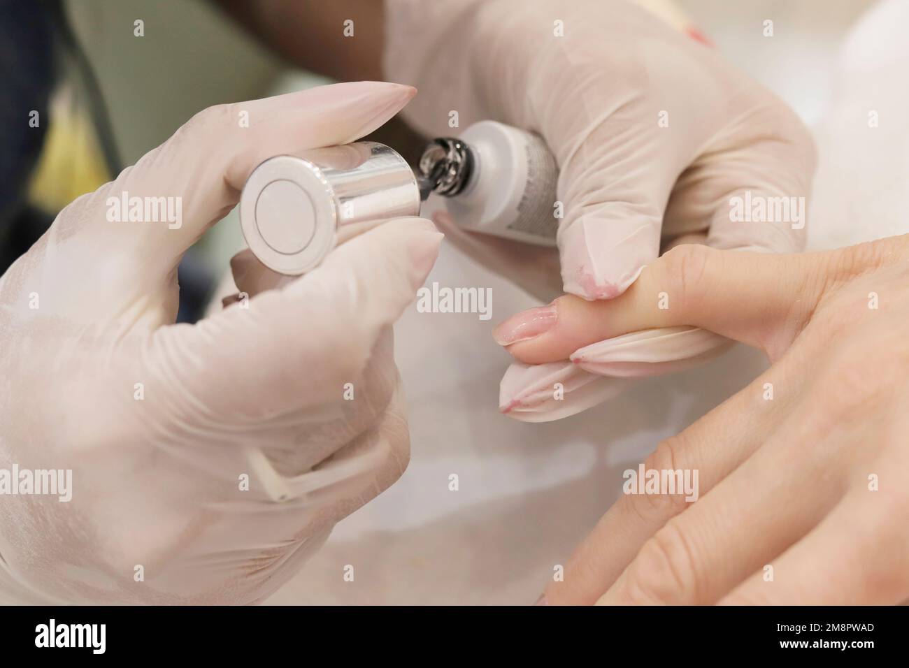 Applying nail hi-res stock photography and images - Alamy