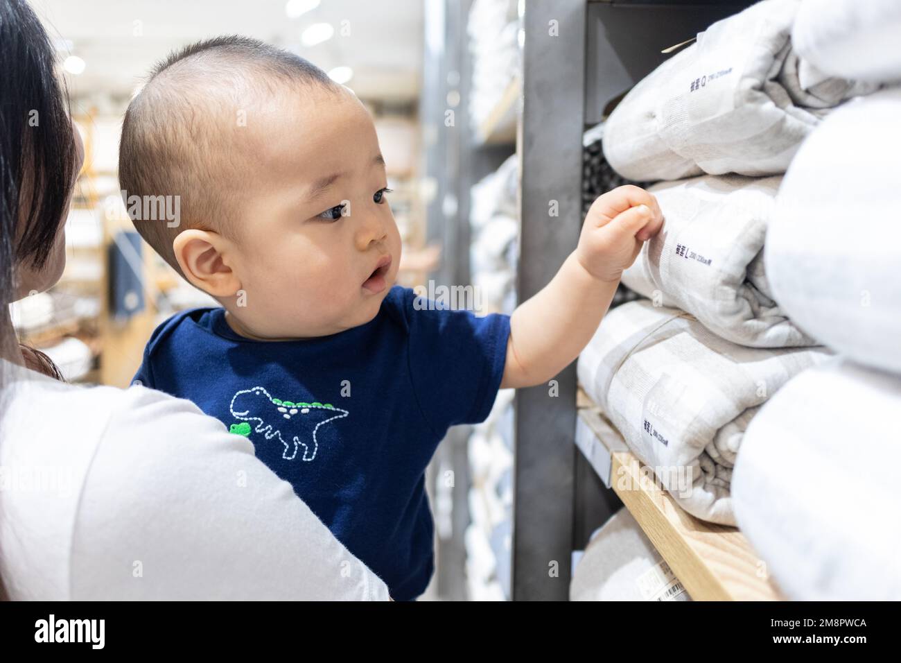 Happy chinese baby boy hi-res stock photography and images - Alamy