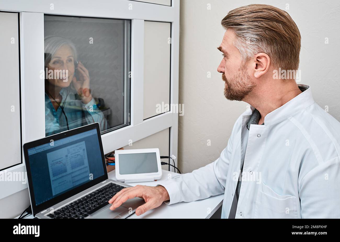 Hearing test booth hi-res stock photography and images - Alamy