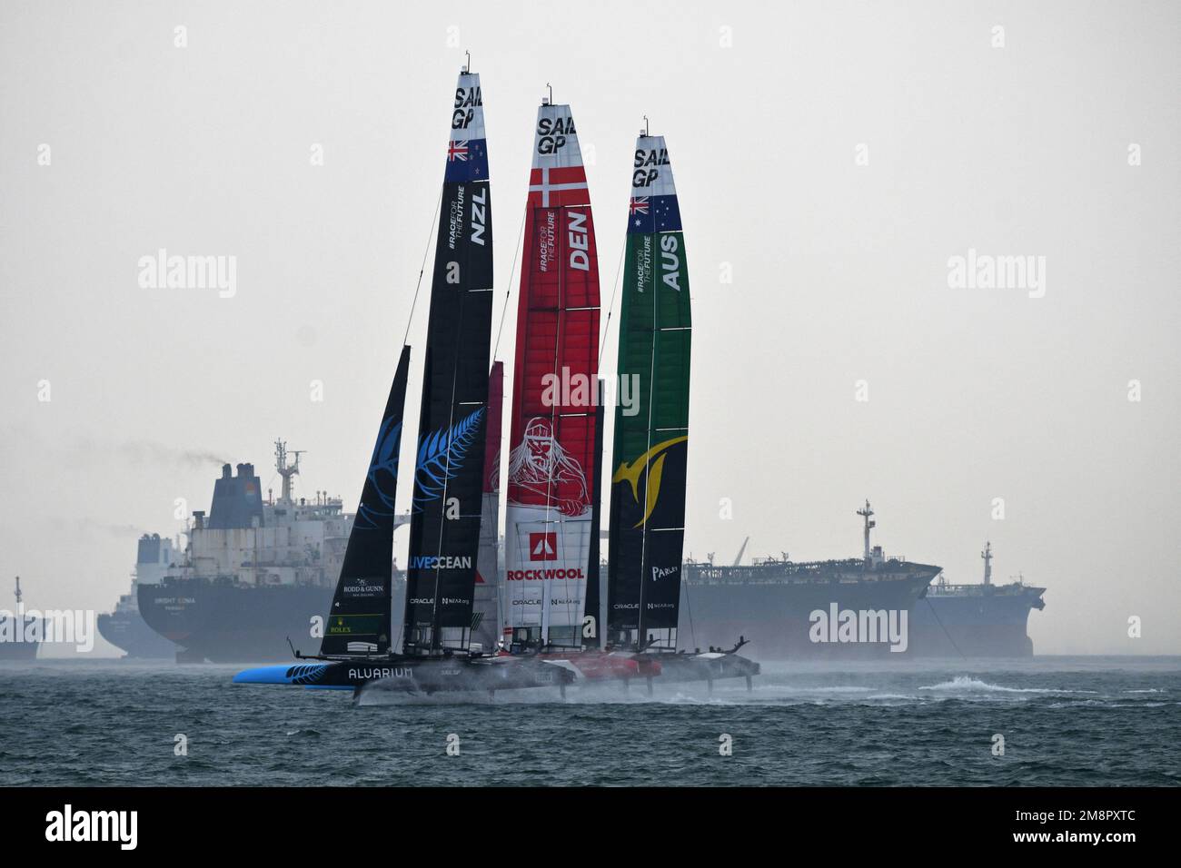 Singapore, New Zealand (L) and Australia sail during the Singapore Sail ...