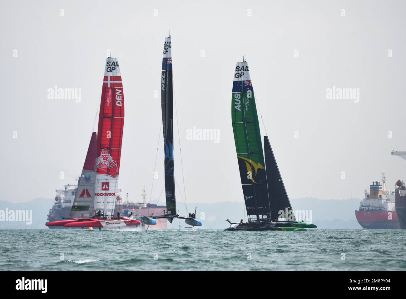 Singapore, New Zealand (C) and Australia sail during the Singapore Sail ...