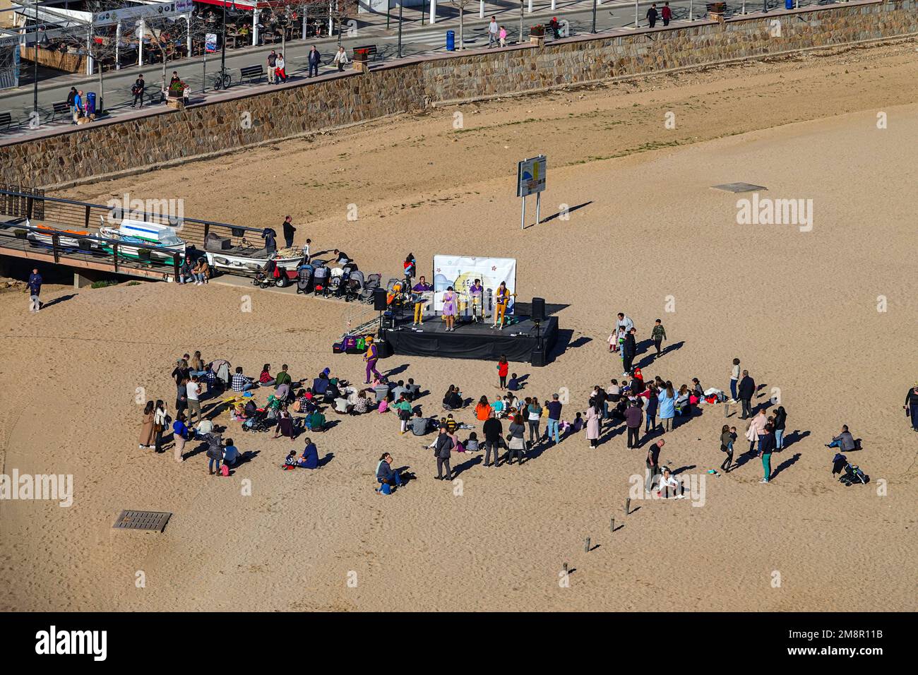 A music band playing on the beach at the ancient town of Tossa del Mar ...