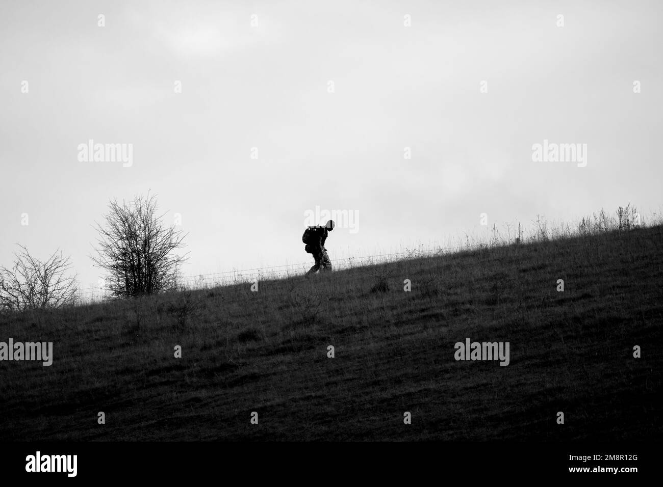 Silhouette of a British army infantry soldier on a fully loaded tab ...