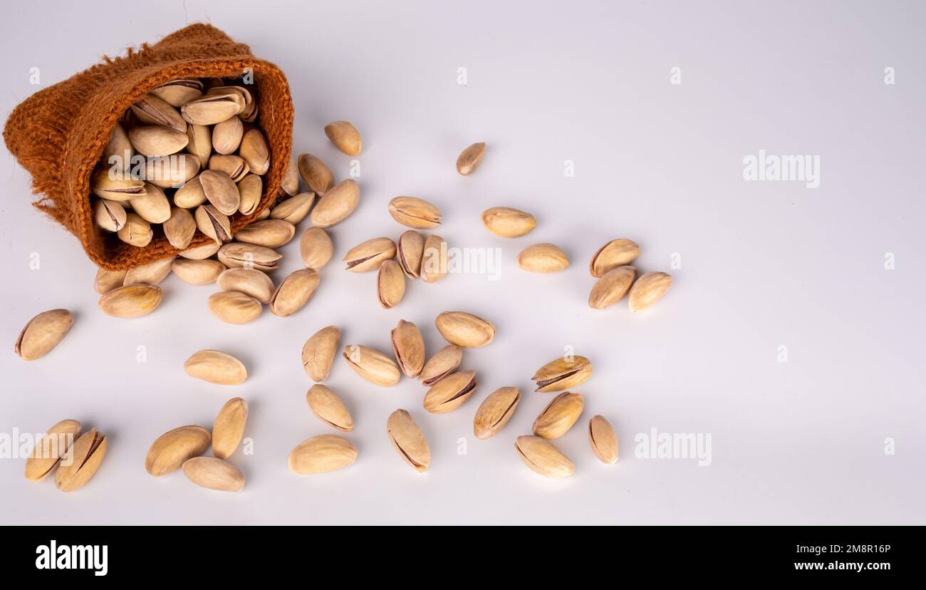 Sack With Pistachios On Isolated On A White Background. Pistachios ...