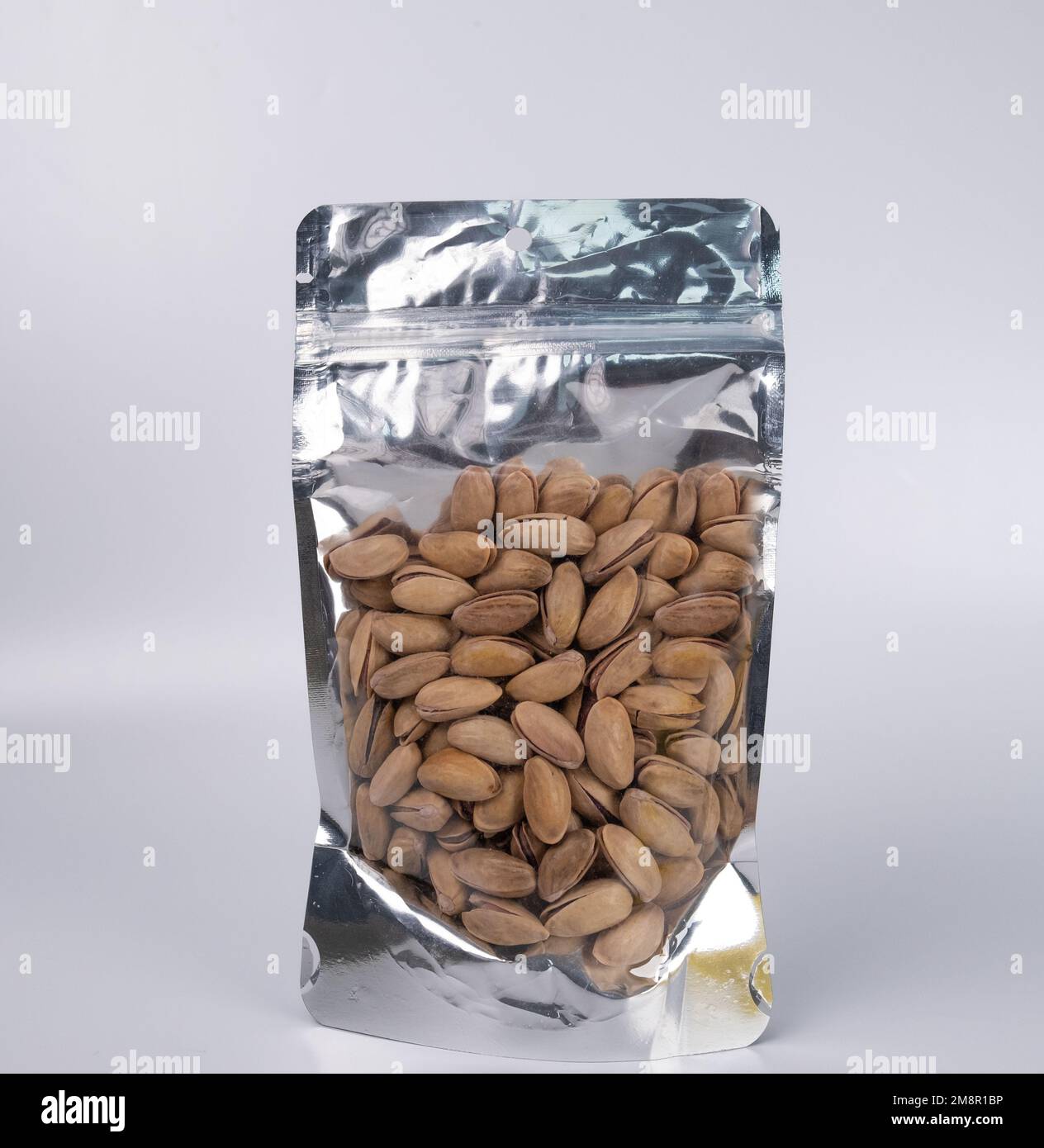 Unpeeled Pistachios in A Doypack or Plastic Package. Pistachios ...