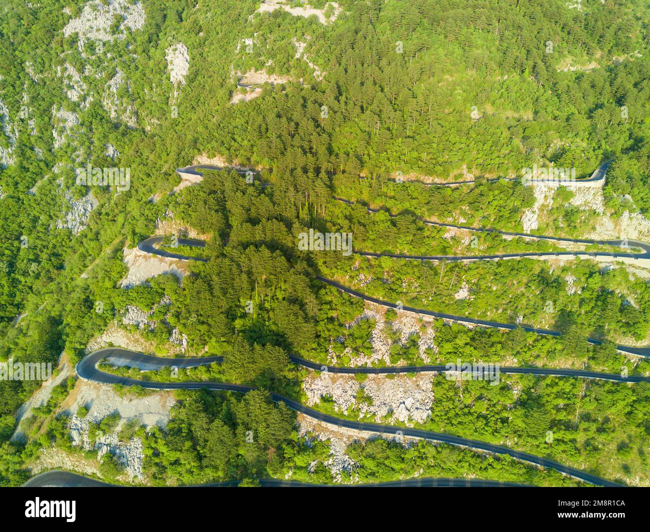 Incredible winding mountain road - Lovcensky serpentine with dangerous ...