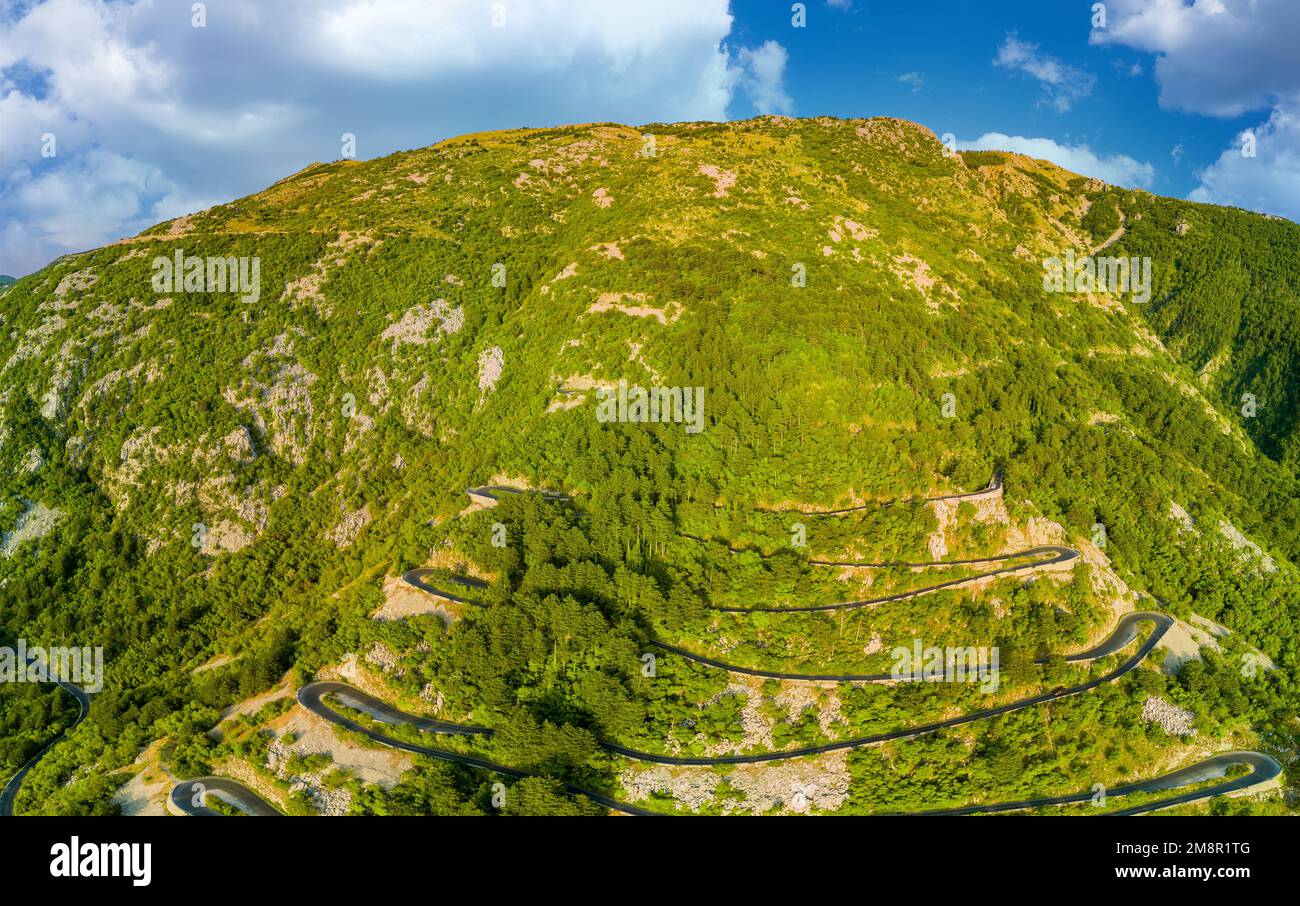 Panorama of incredible winding mountain road - Lovcensky serpentine ...