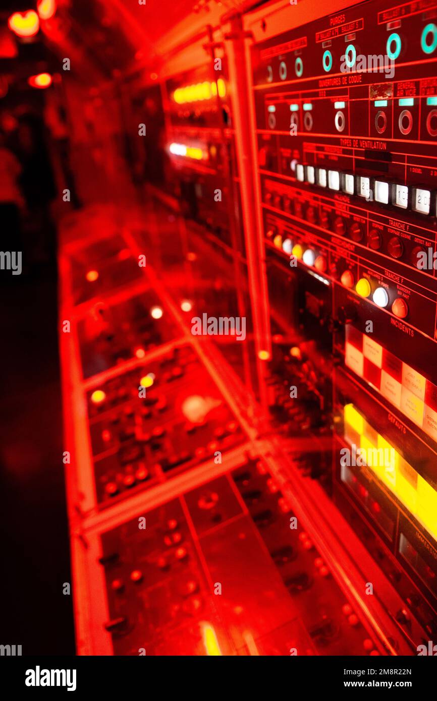The interior of a modern railway control room with red electronic ...